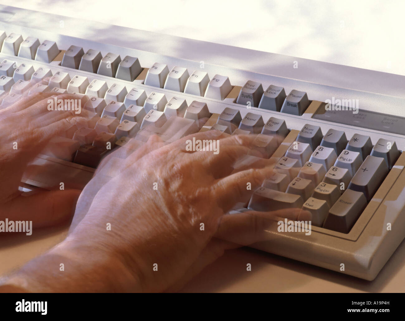Motion blur action on wrist and fingers using a computer keyboard Stock ...