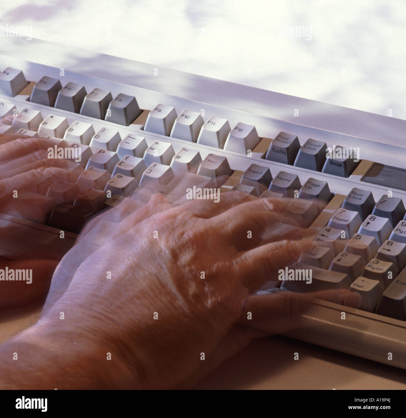 Motion blur action on wrist and fingers using a computer keyboard Stock ...