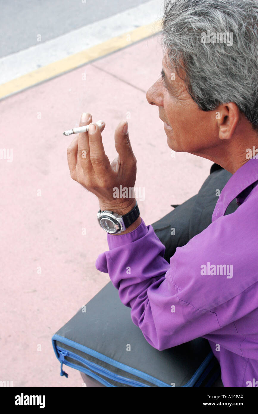American adult man smoking cigarette hi-res stock photography and ...