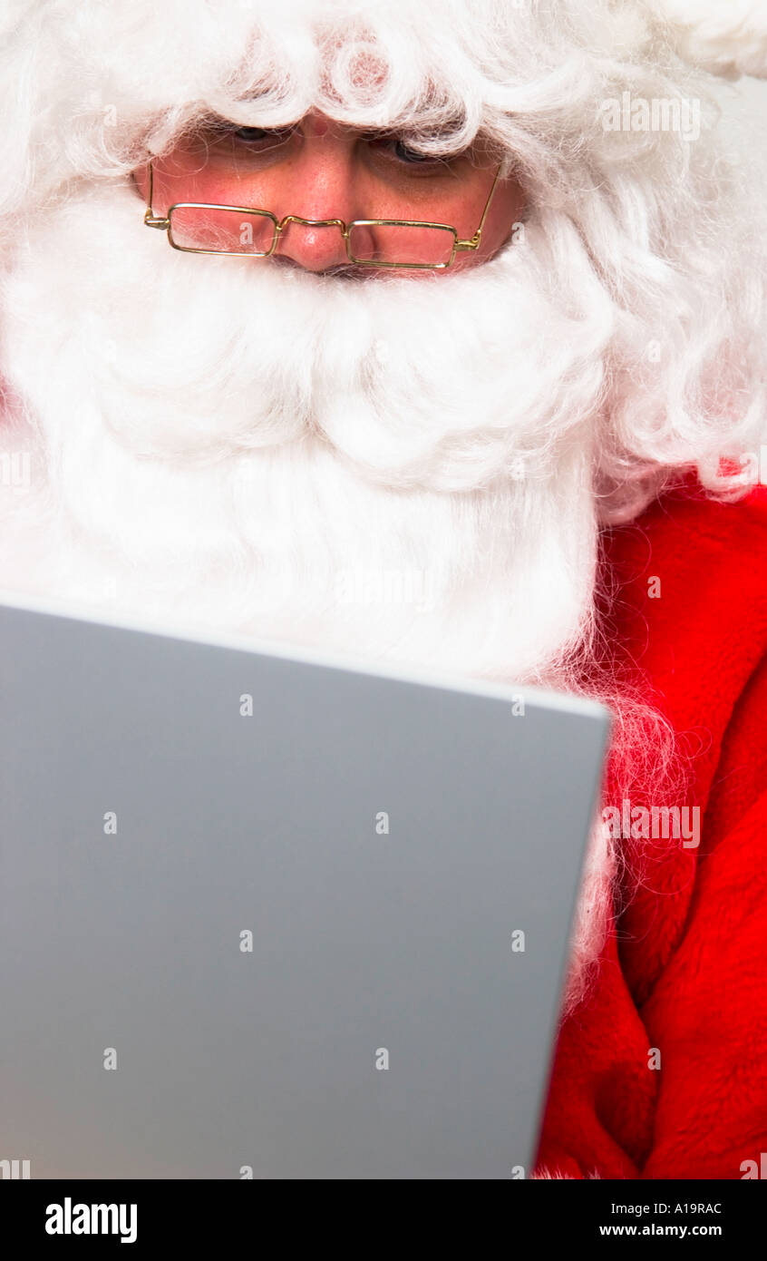 Santa claus laptop checking hi-res stock photography and images - Alamy
