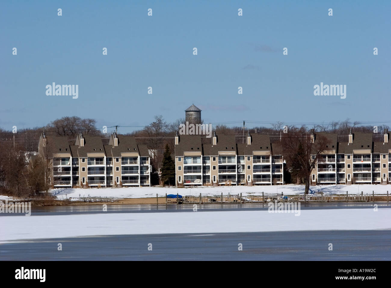 Condos across the lake Stock Photo - Alamy