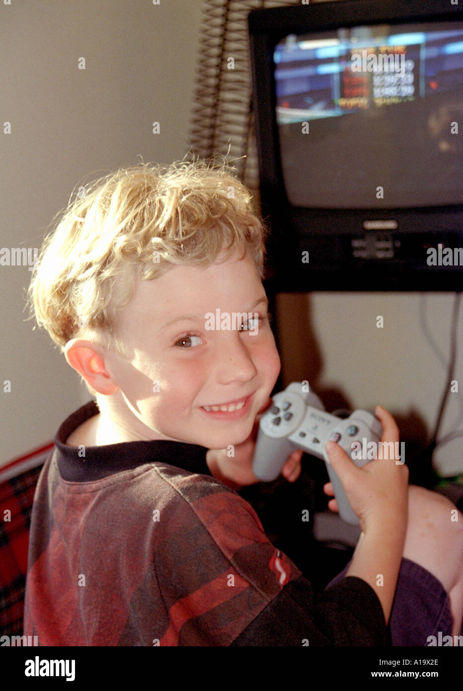 A YOUNG BOY PLAYING A COMPUTER GAME Stock Photo - Alamy