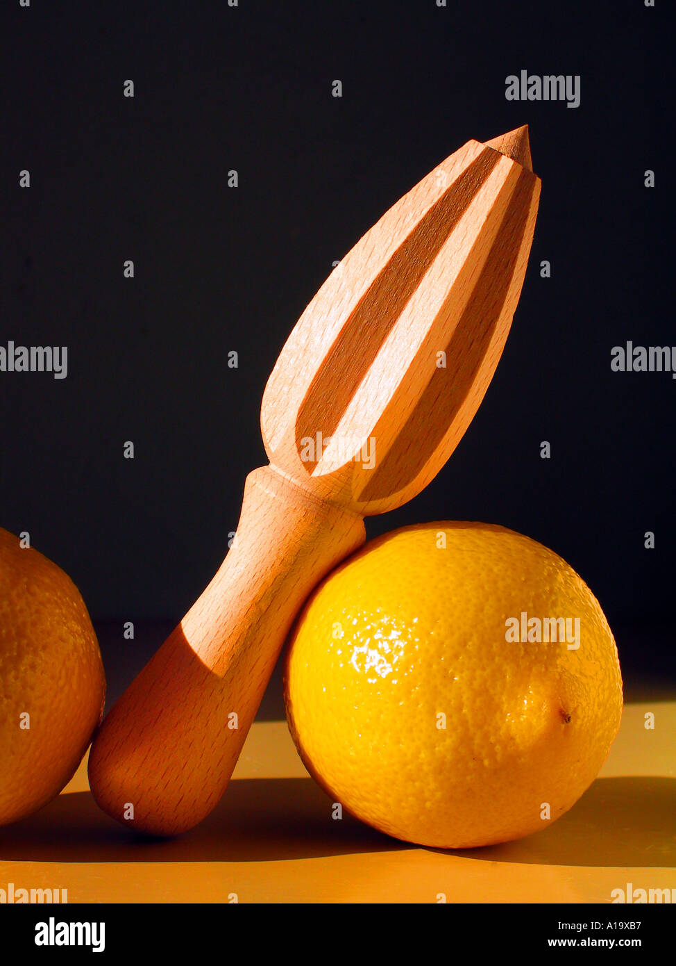 Wooden Lemon Reamer Stock Photo - Alamy