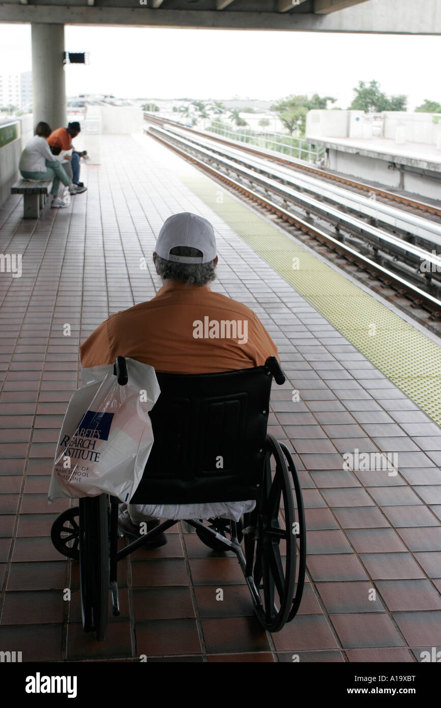 Miami Florida,Metrorail,Civic Center Station,adult adults man men male ...