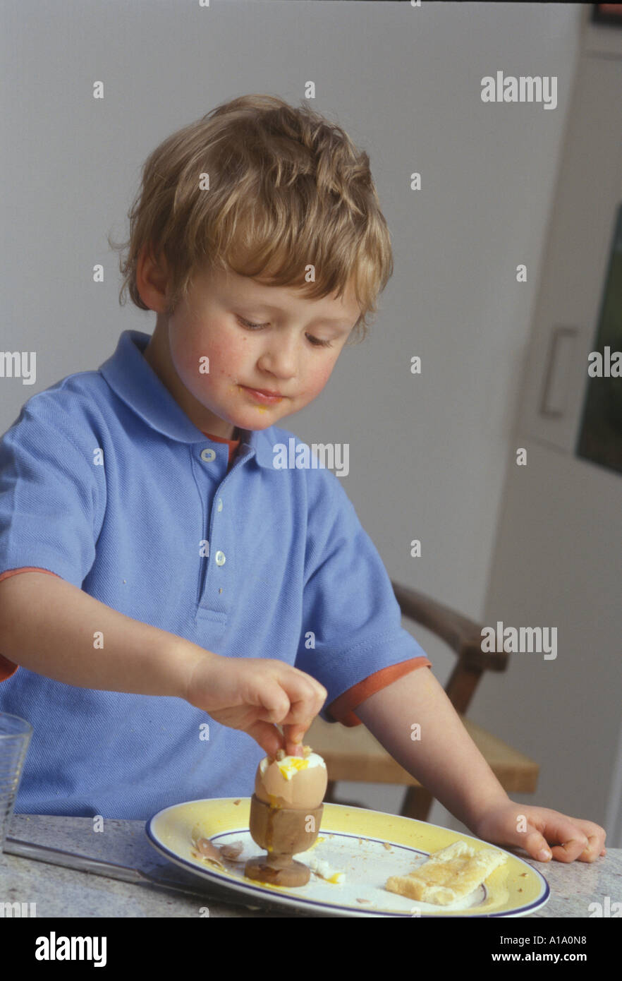 boy eating boiled egg Stock Photo - Alamy