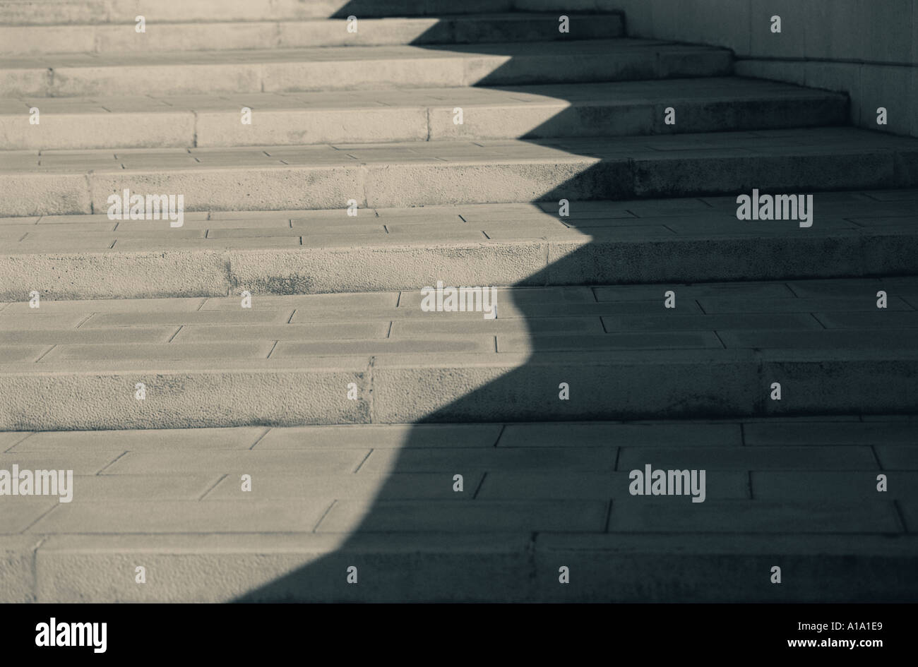 zig zag pattern jagged shadow cast onto stone steps Stock Photo - Alamy
