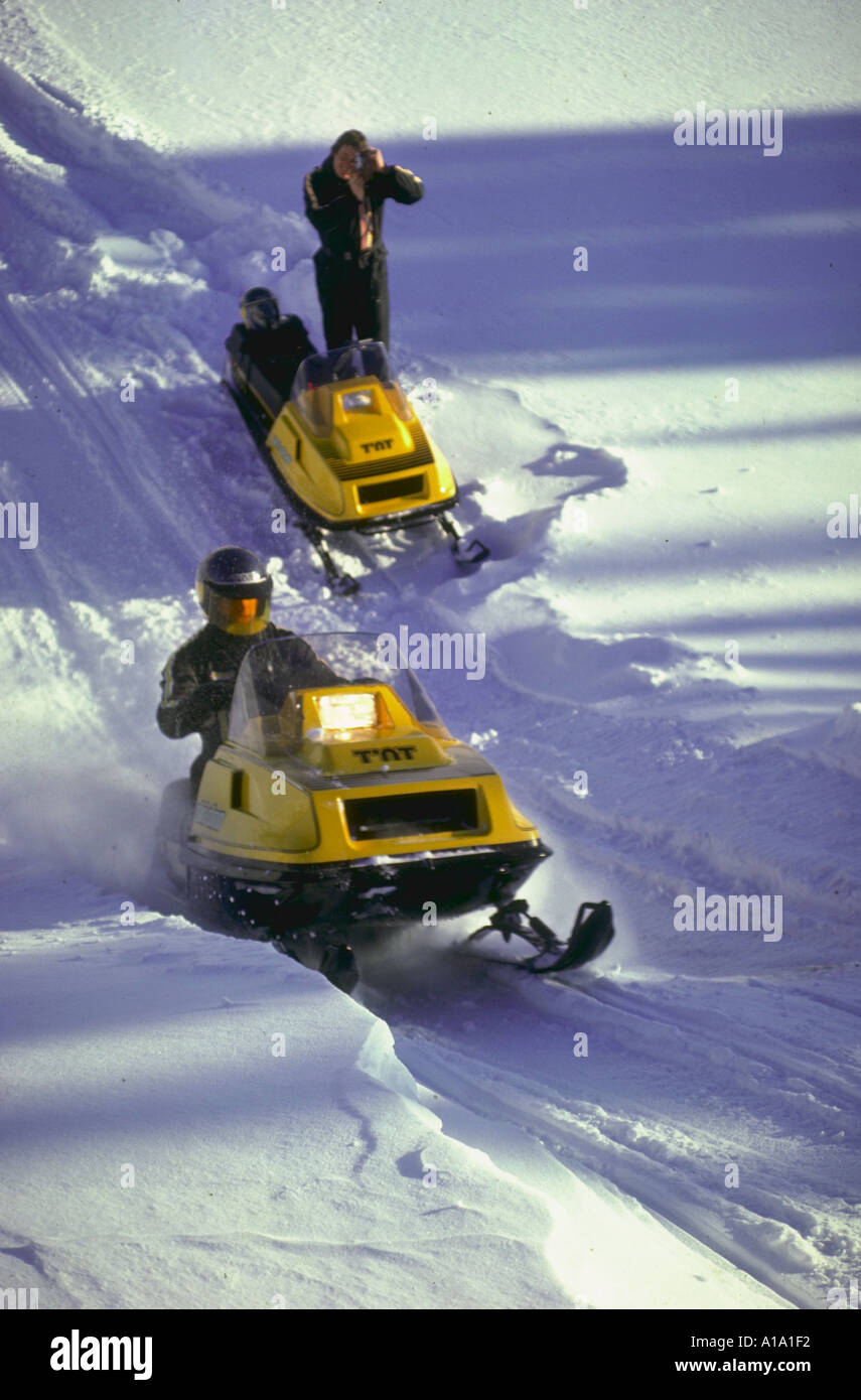 Two people riding snowmobile hi-res stock photography and images - Alamy