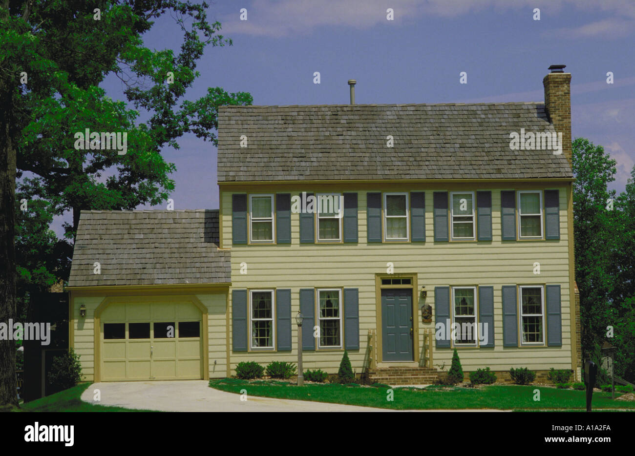 Exterior view of a middle class frame colonial home Property released ...