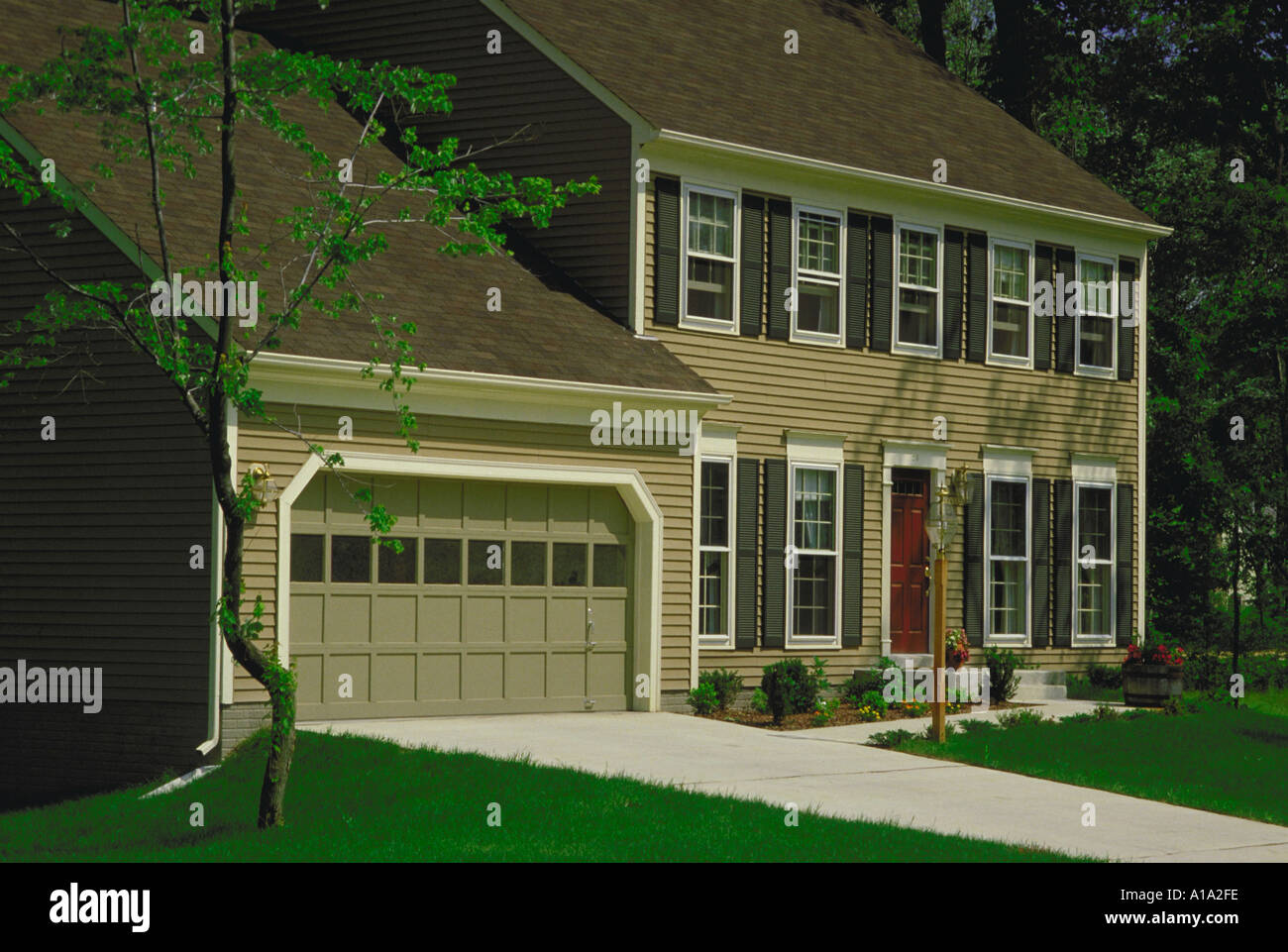 Exterior view of a traditional colonial style middle class home ...