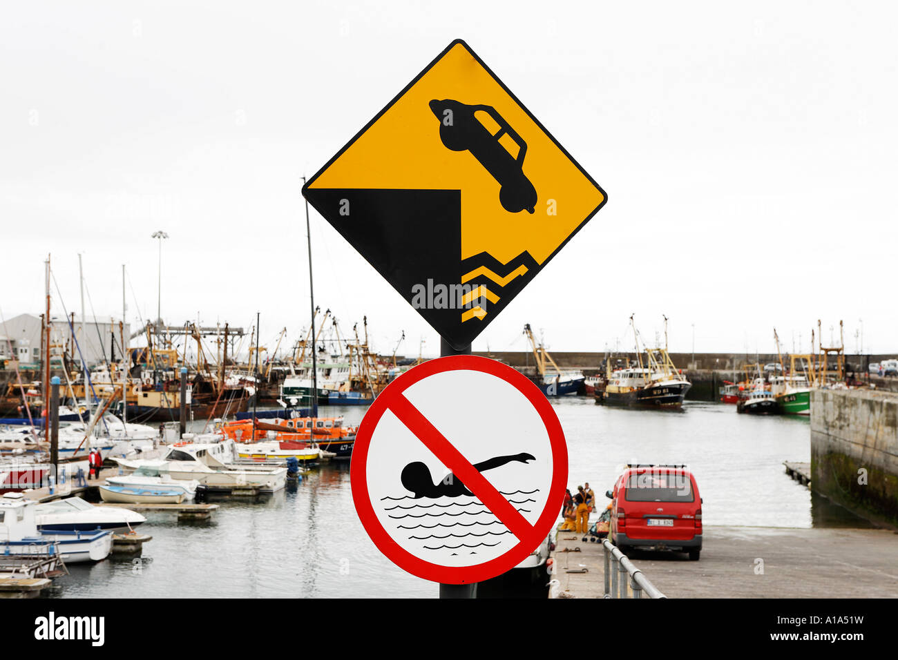 Warning signs, Kilmore Quay, Wexford, Ireland Stock Photo - Alamy