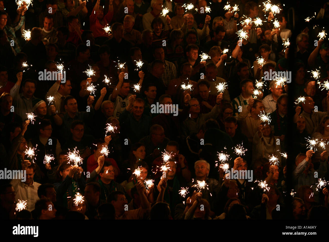 Fans with sparklers Stock Photo - Alamy