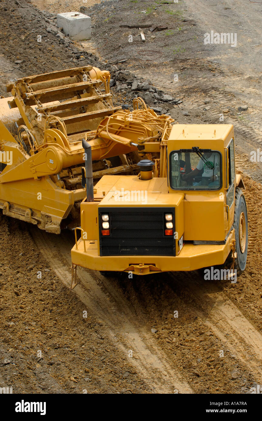Caterpillar grader at work, highway construction site Stock Photo - Alamy