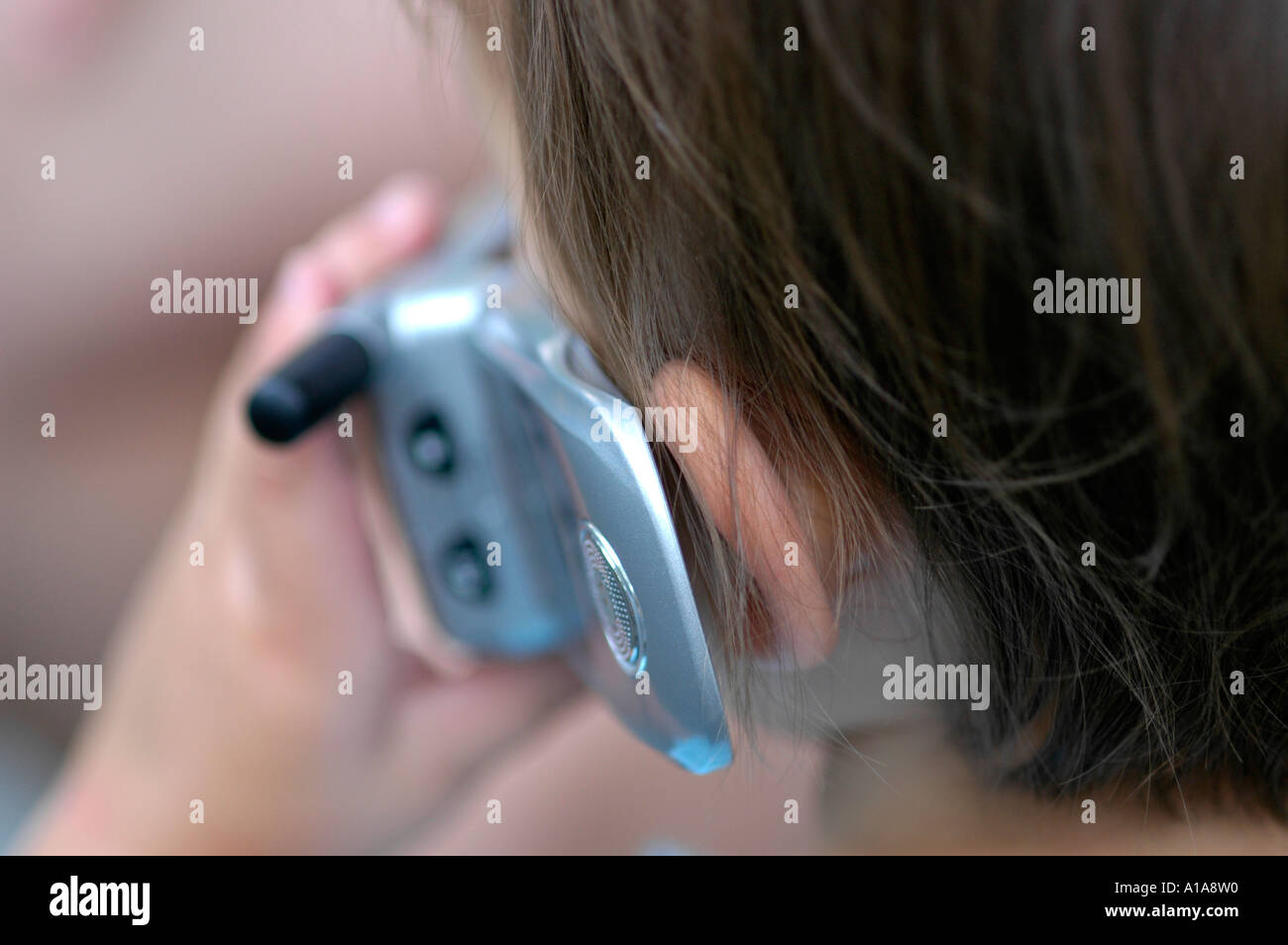 Toddler using a cell phone Stock Photo - Alamy