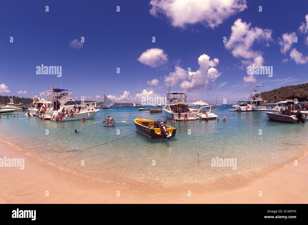 Anguilla beach Sandy Ground people partying on boats anchored offshore ...