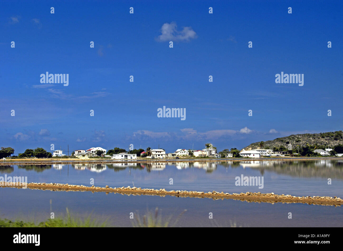 Anguilla salt pans full of water Sandy Ground in the distance behind ...