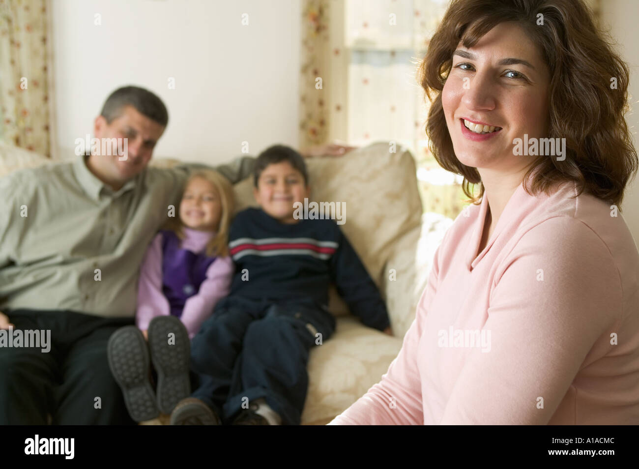 Mother and her family Stock Photo - Alamy
