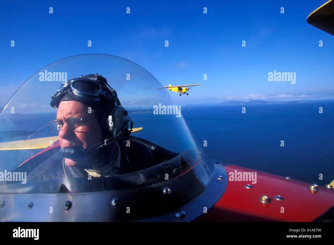 USA Washington Rod Magner pilots TravelAir Biplane flying with Piper ...