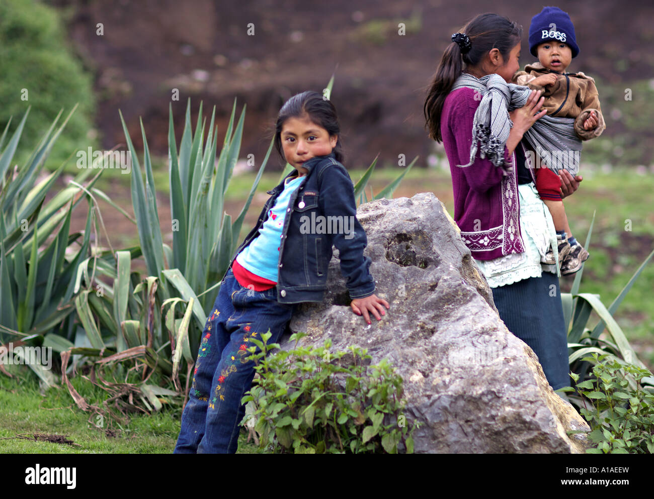 GUATEMALA CAPELLANIA Young indigenous Maya Ixil sisters showing the ...