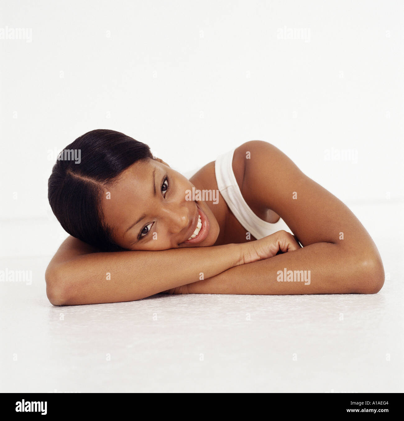 Woman resting head on arms hi-res stock photography and images - Alamy