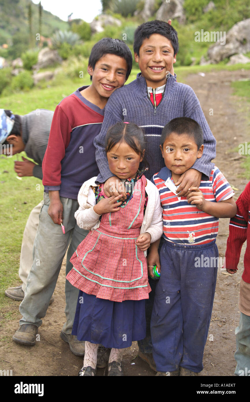 GUATEMALA CAPELLANIA Indigenous Maya Quiche children clowning around ...