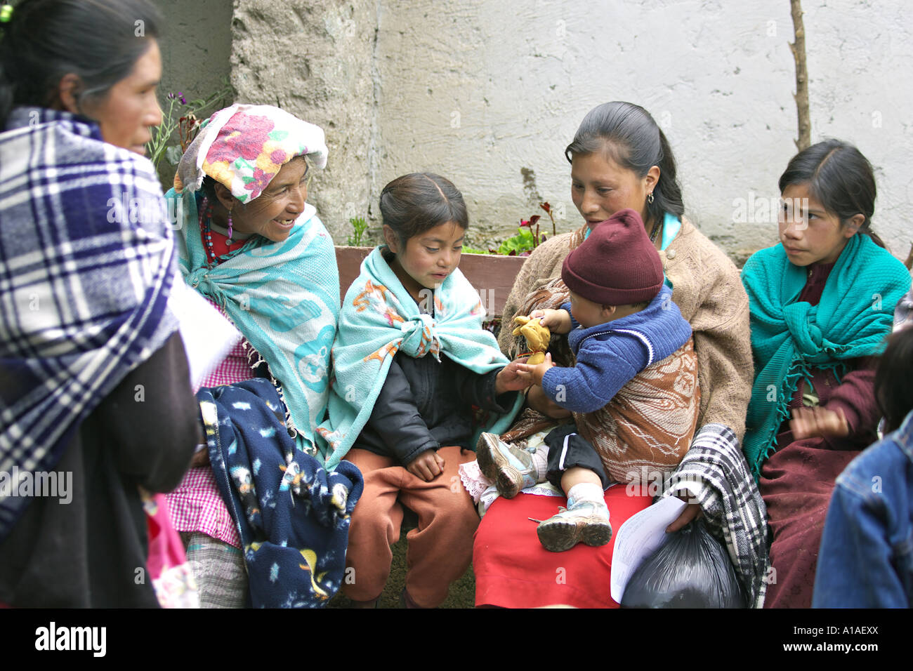 GUATEMALA CAPELLANIA Three generations of women from an Indigenous Maya ...