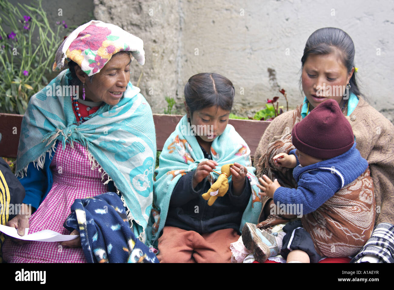 GUATEMALA CAPELLANIA Three generations of women from an Indigenous Maya ...