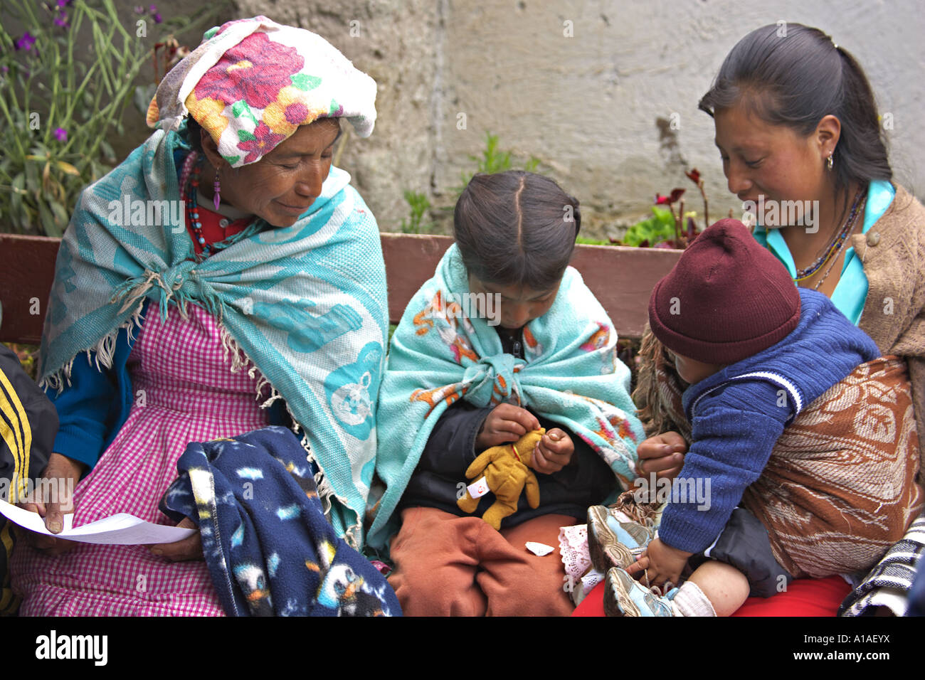 GUATEMALA CAPELLANIA Three generations of women from an Indigenous Maya ...