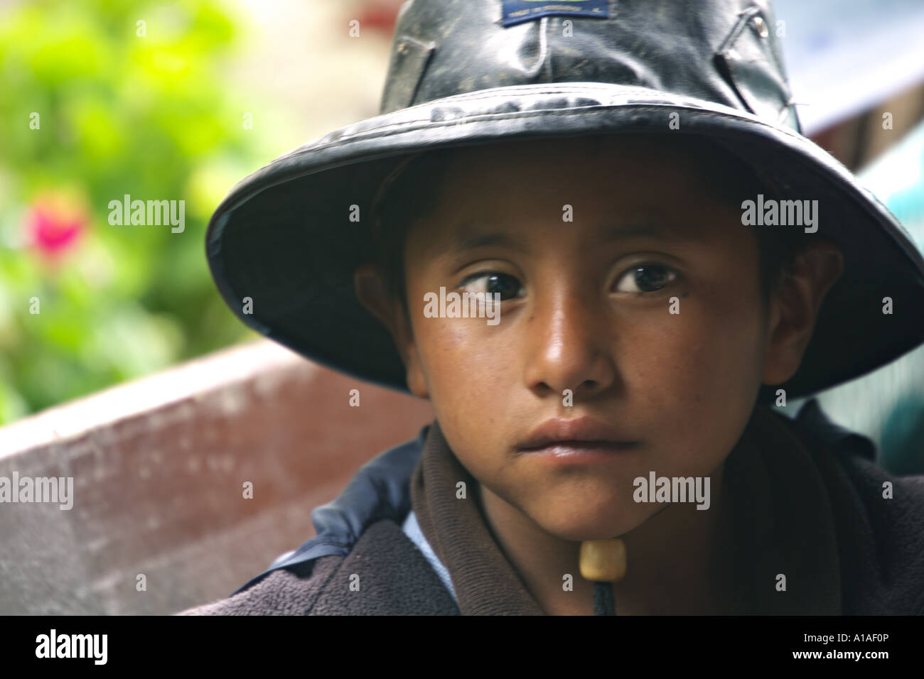 GUATEMALA CAPELLANIA Young indigenous Maya Ixil boy waiting to be seen ...
