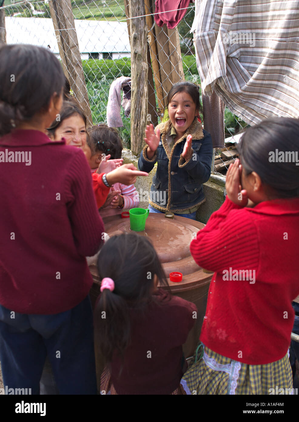 GUATEMALA CAPELLANIA Young indigenous Maya Quiche girls playing a ...