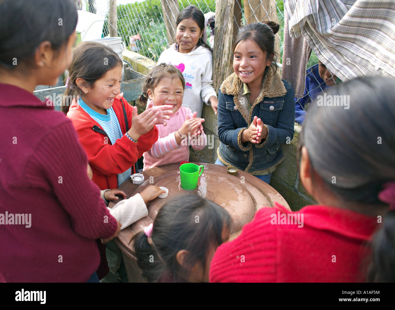 GUATEMALA CAPELLANIA Young indigenous Maya Quiche girls playing a ...