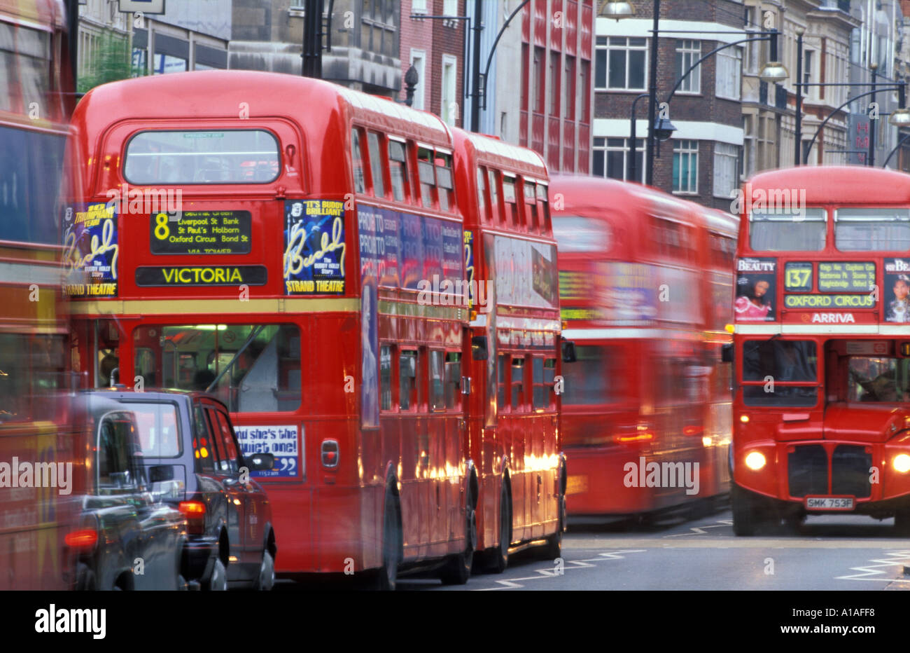 Buses Taxis on Oxford Street London UK Stock Photo - Alamy