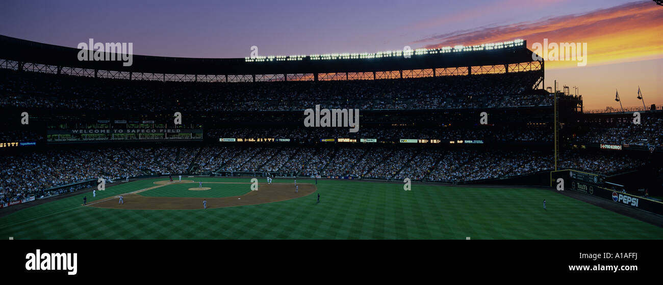 USA Washington Setting summer sun lights clouds above Safeco Field ...