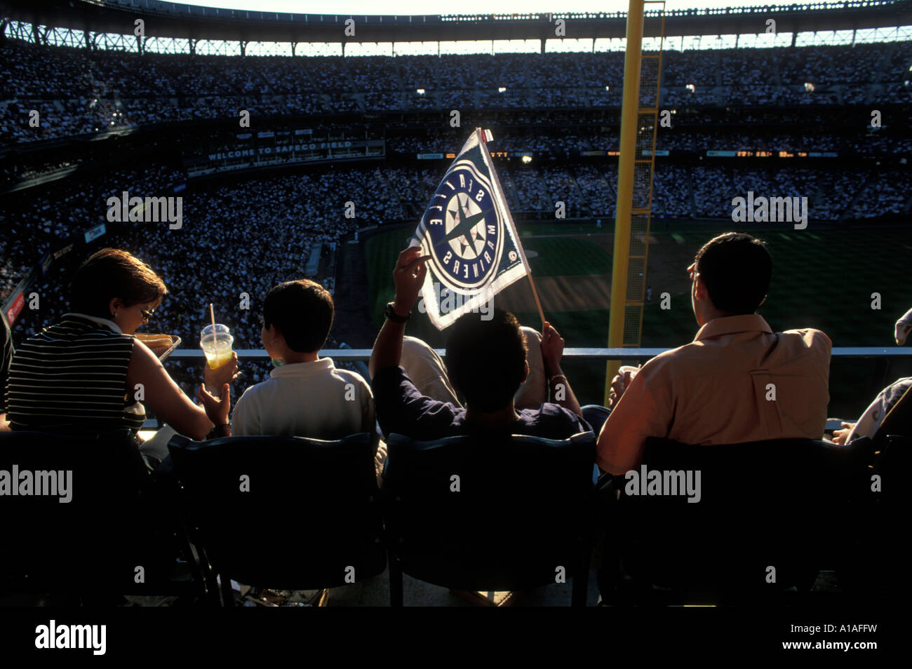 USA Washington Seattle Mariners fan waves flag from upper deck at ...