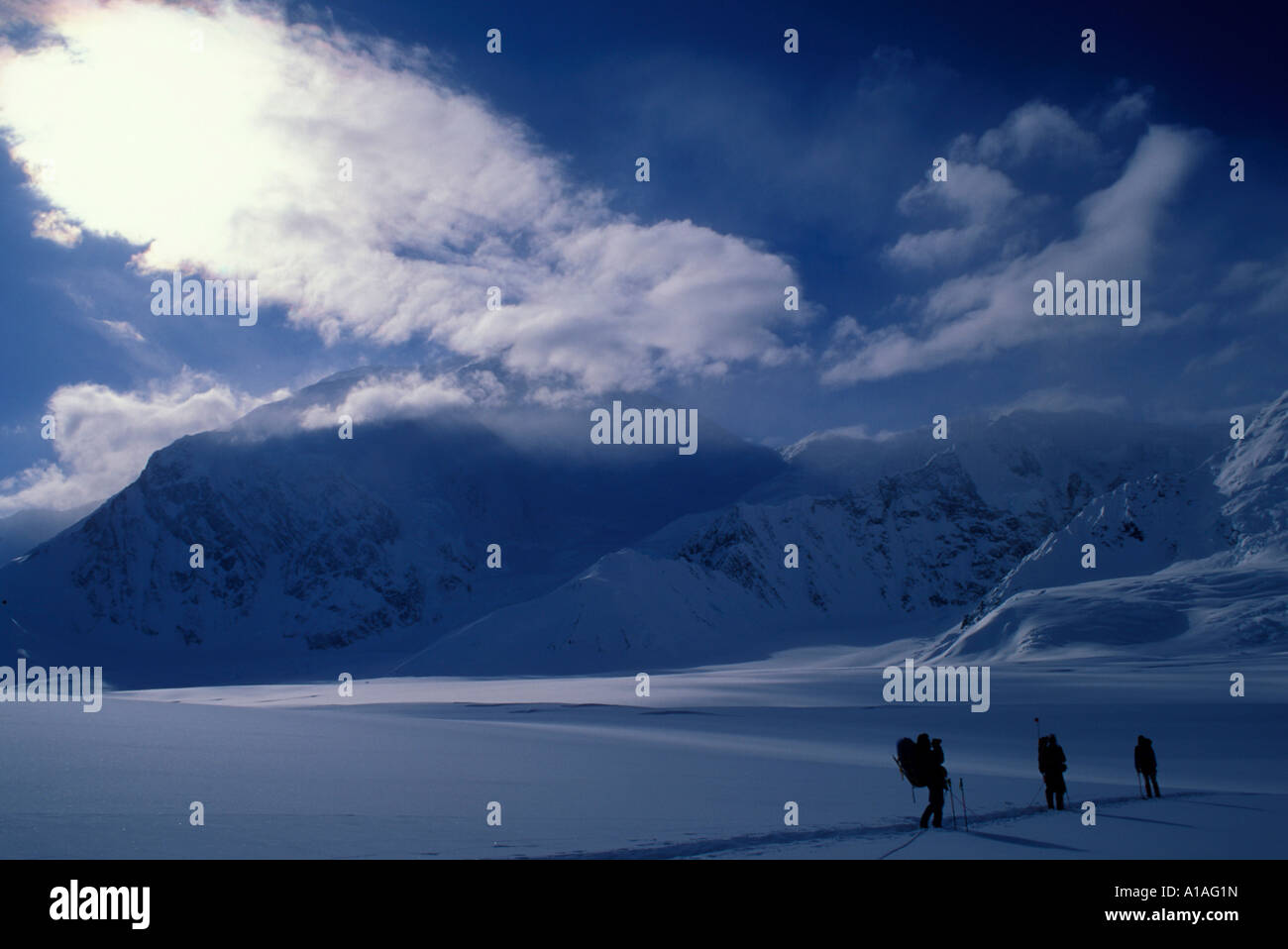 USA Alaska Denali National Park MR Line of climbers on Kahiltna Glacier ...