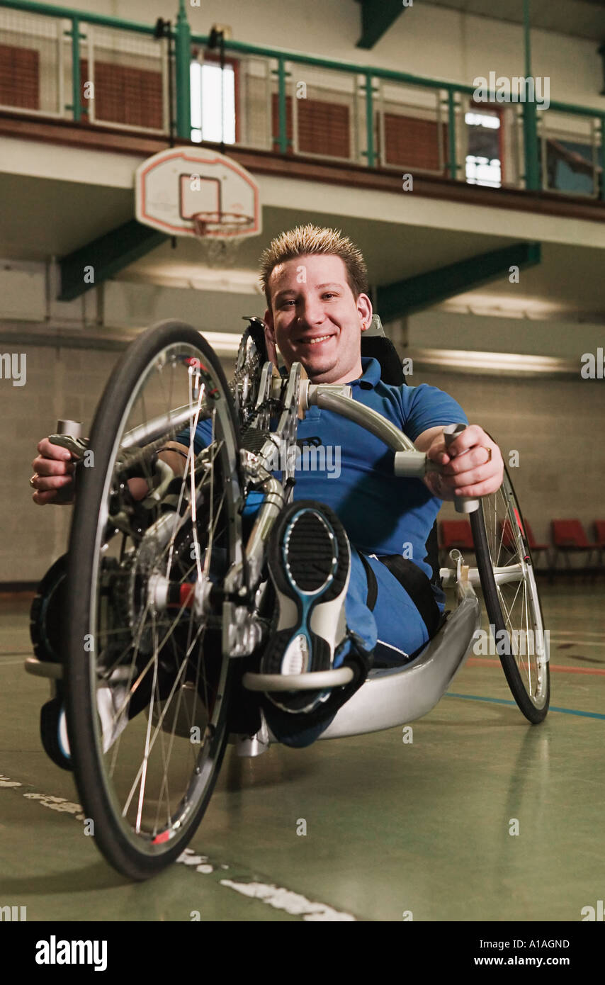 Disabled man using adapted bicycle Stock Photo - Alamy