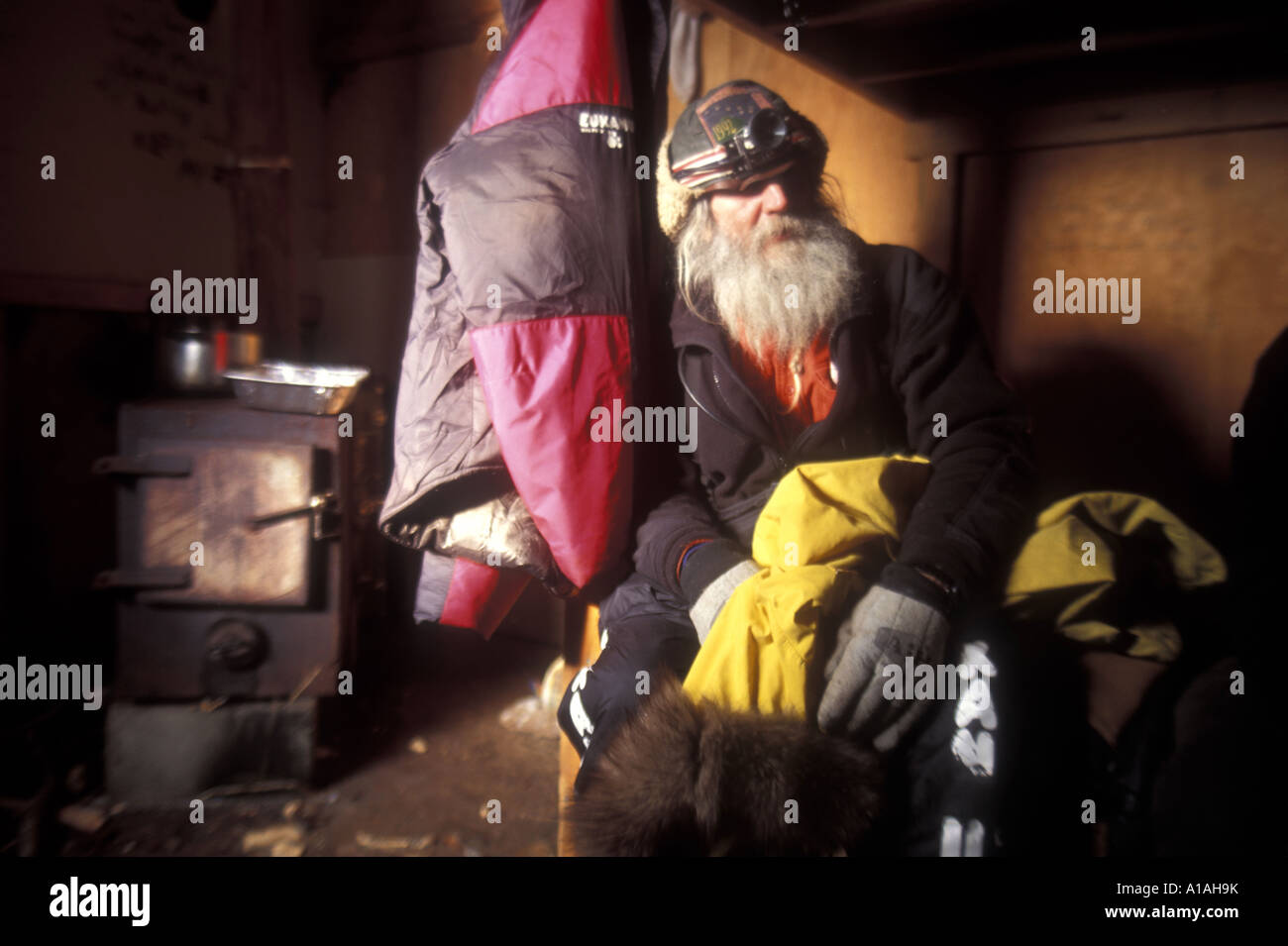 USA Alaska Musher Charlie Boulding rests at Old Woman Cabin 35 miles ...