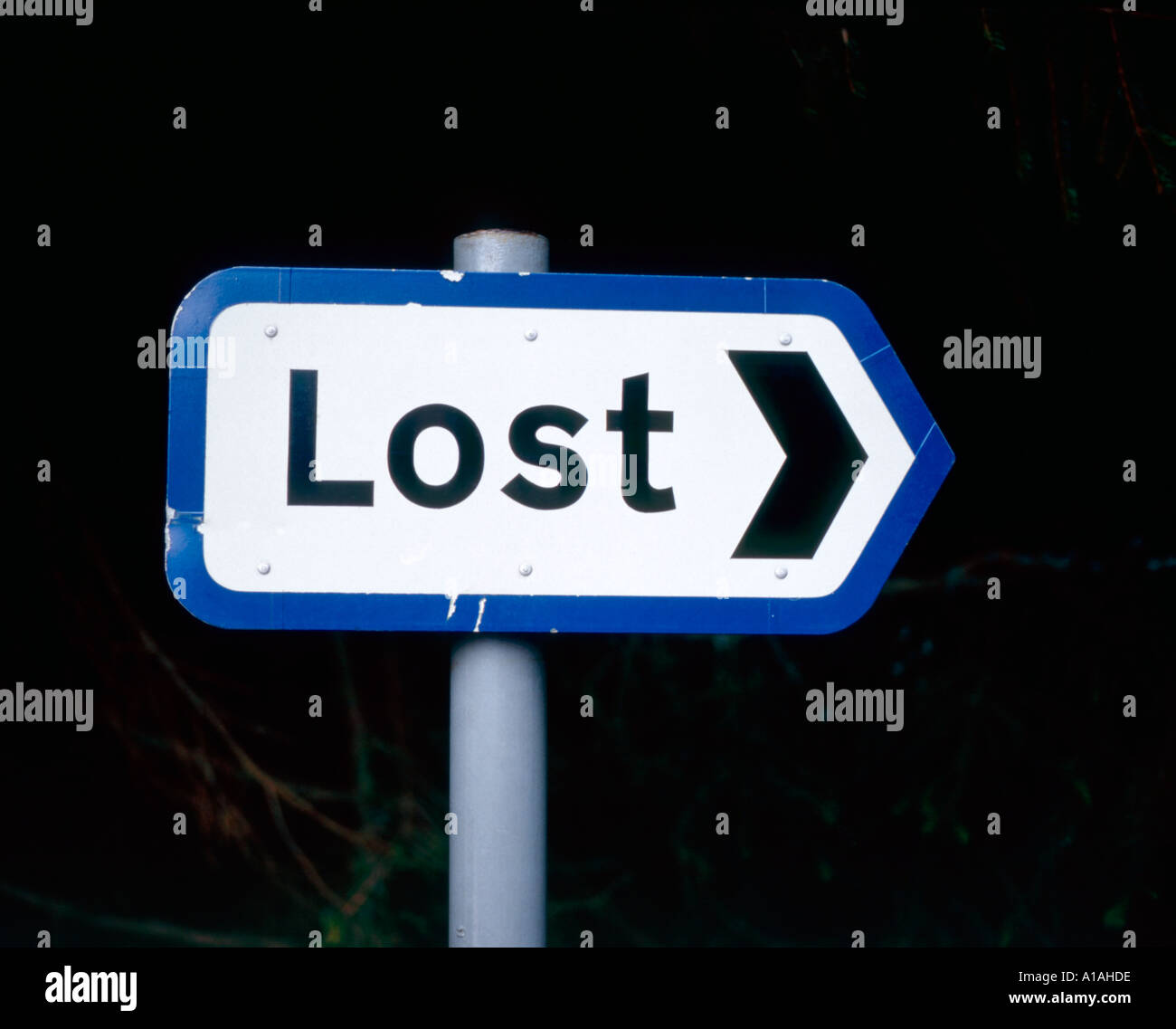 Direction sign pointing to Lost Stock Photo - Alamy