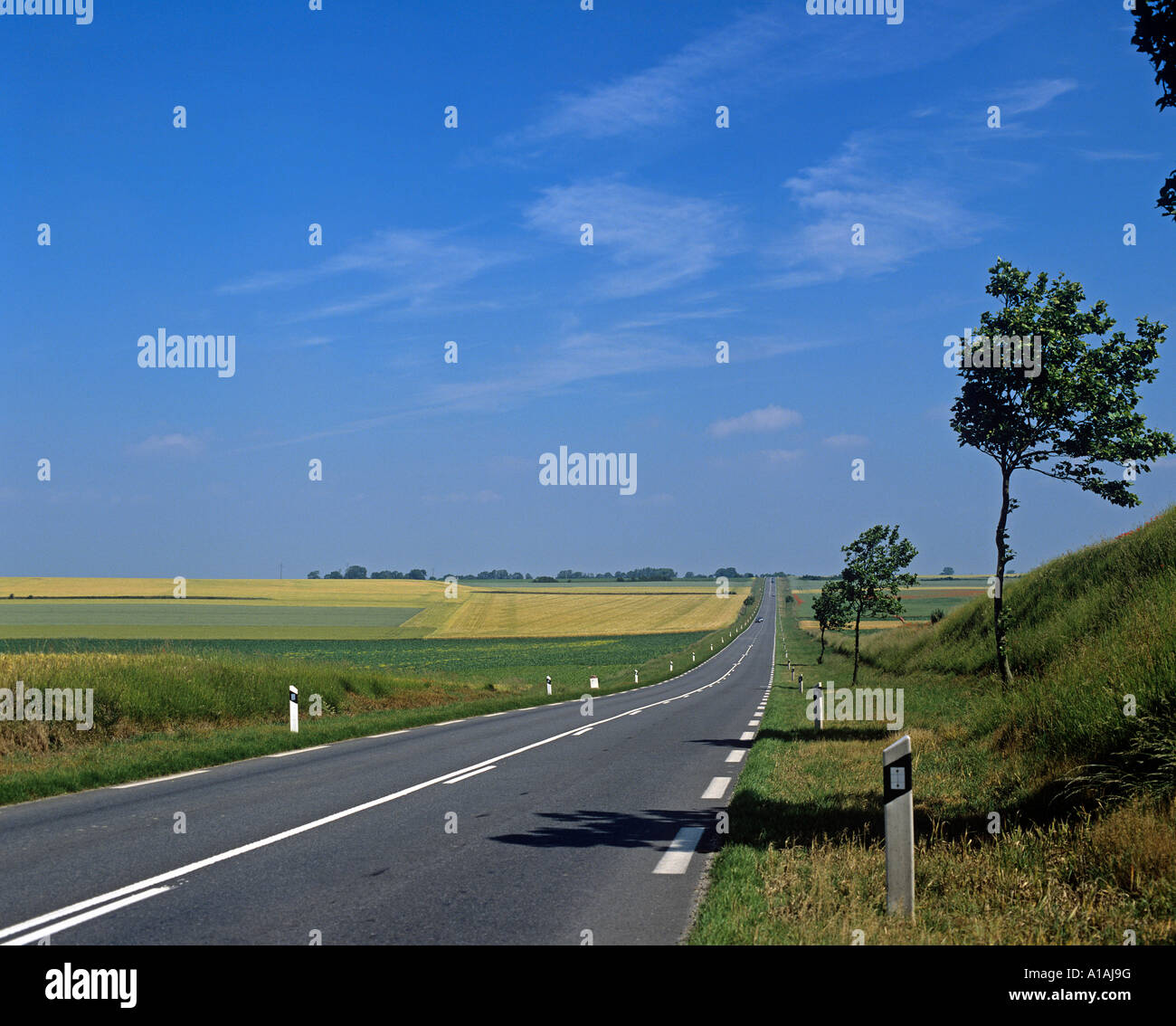 Highway through undulating farmland North of Beauvais Isle de France ...