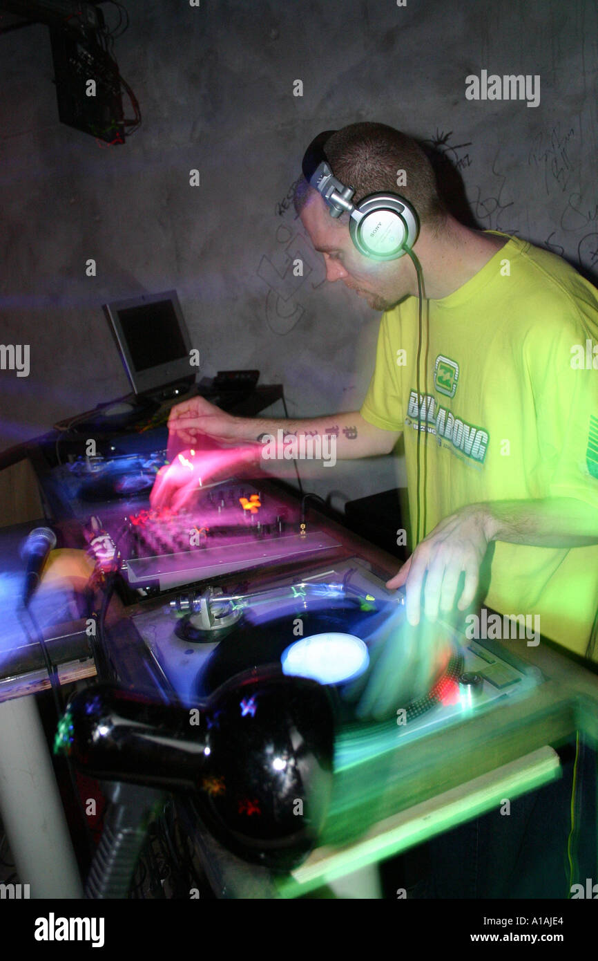 Dj performing at a night club Stock Photo - Alamy