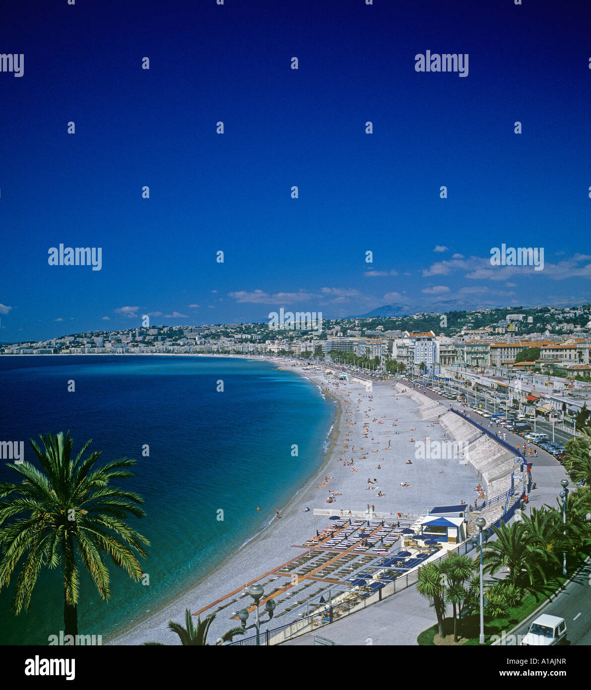 pebble beach backed by the famous Promenade des Anglais Nice Stock ...