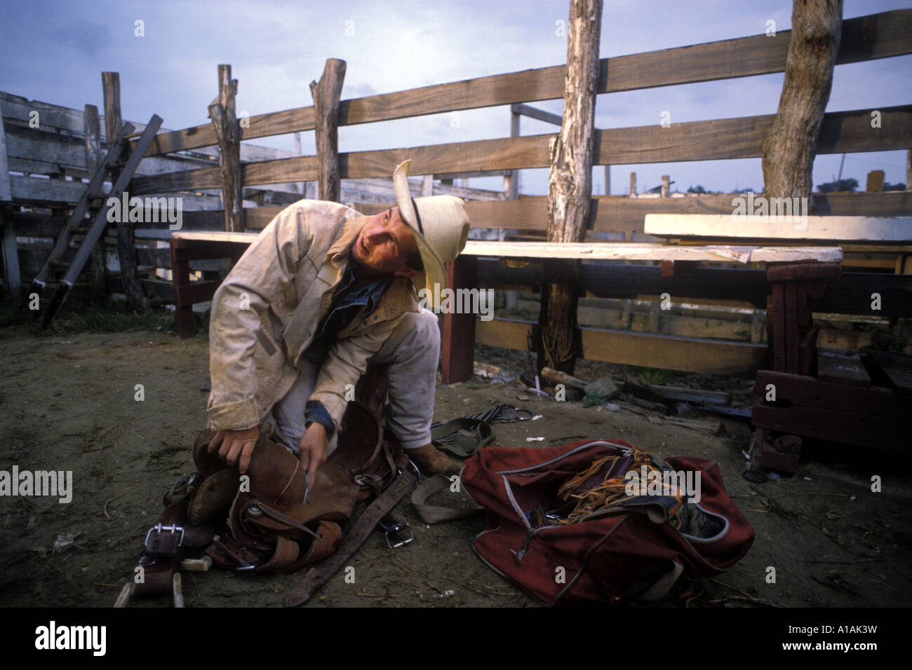 USA New Jersey Woodstown Rodeo cowboy prepares for event by rough stock ...