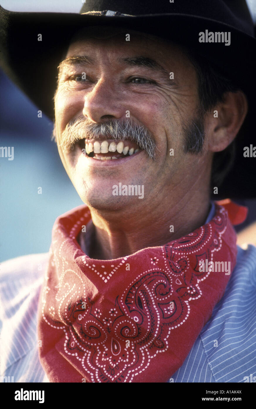 USA New Jersey Woodstown Portrait of rodeo cowboy at sunset during ...