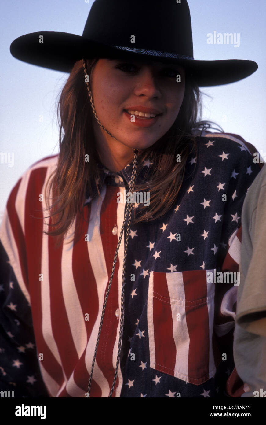 USA Washington Sedro Woolley MR Rodeo cowgirl at Logger Rodeo at sunset ...