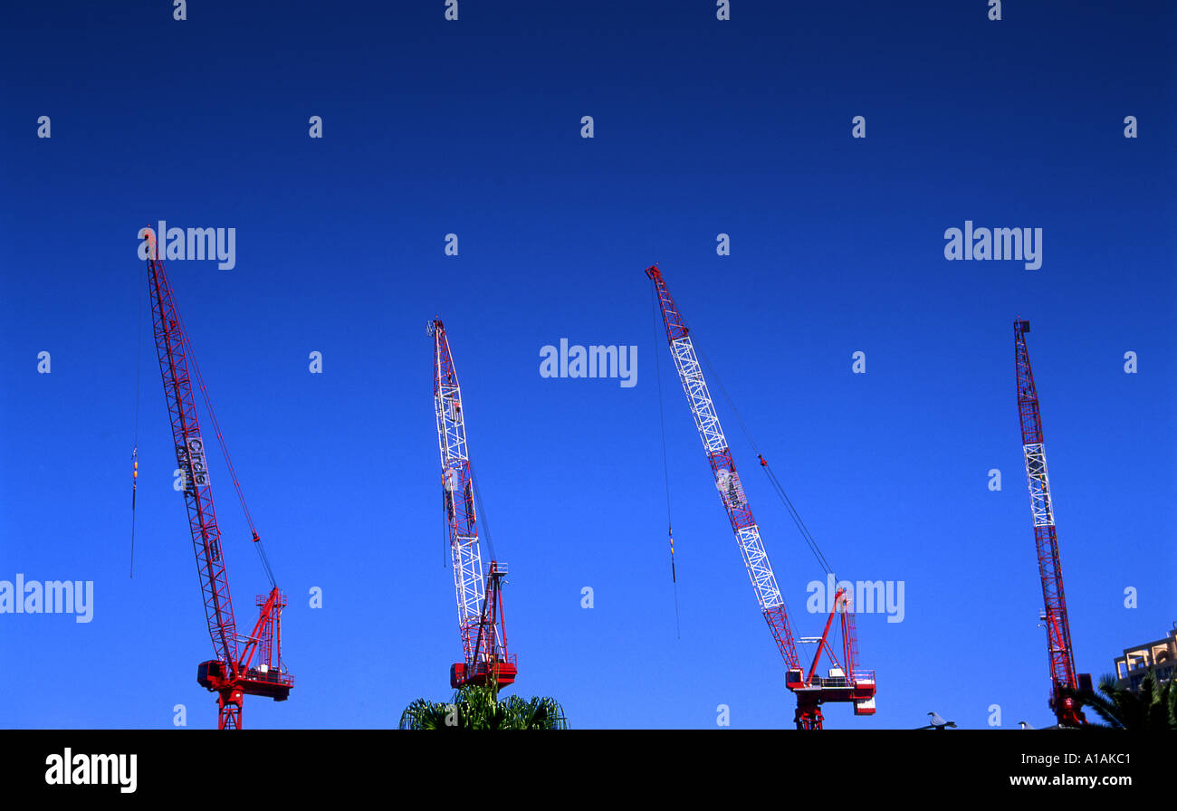 four construction cranes Stock Photo - Alamy
