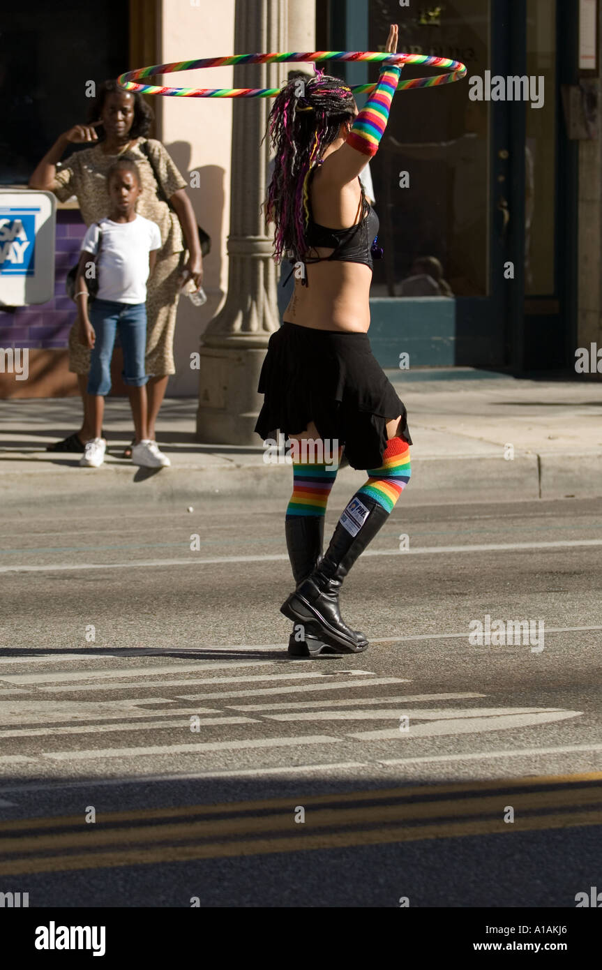 Gothic young woman marching with a hula hoop at the Doo-Dah Parade in ...