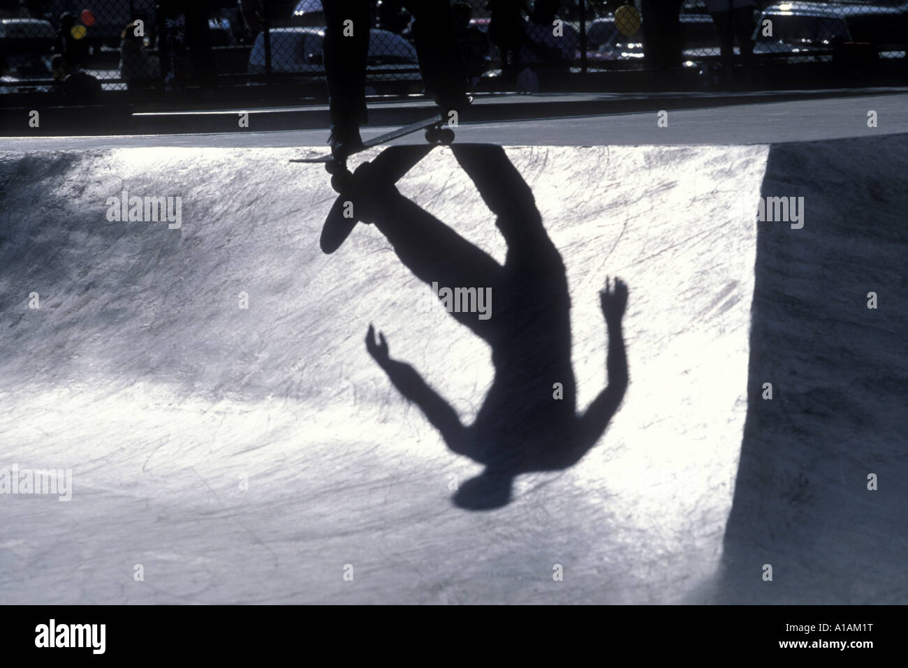 USA, Washington, Seattle, Skateboarder's shadow on jump in ...