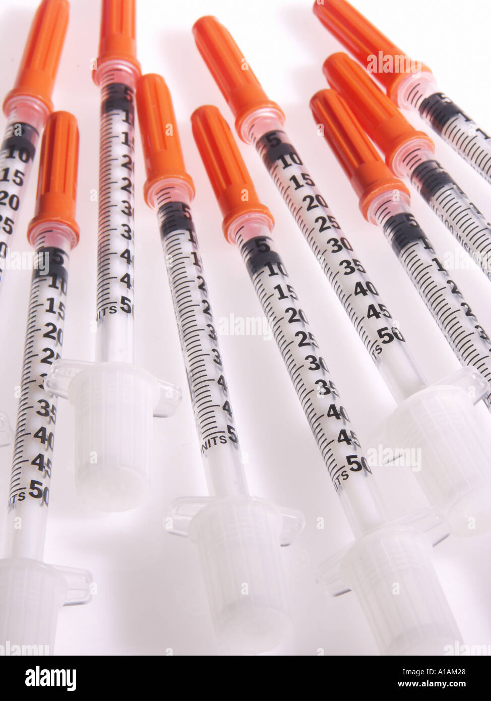 Insulin syringes with protective caps Stock Photo - Alamy