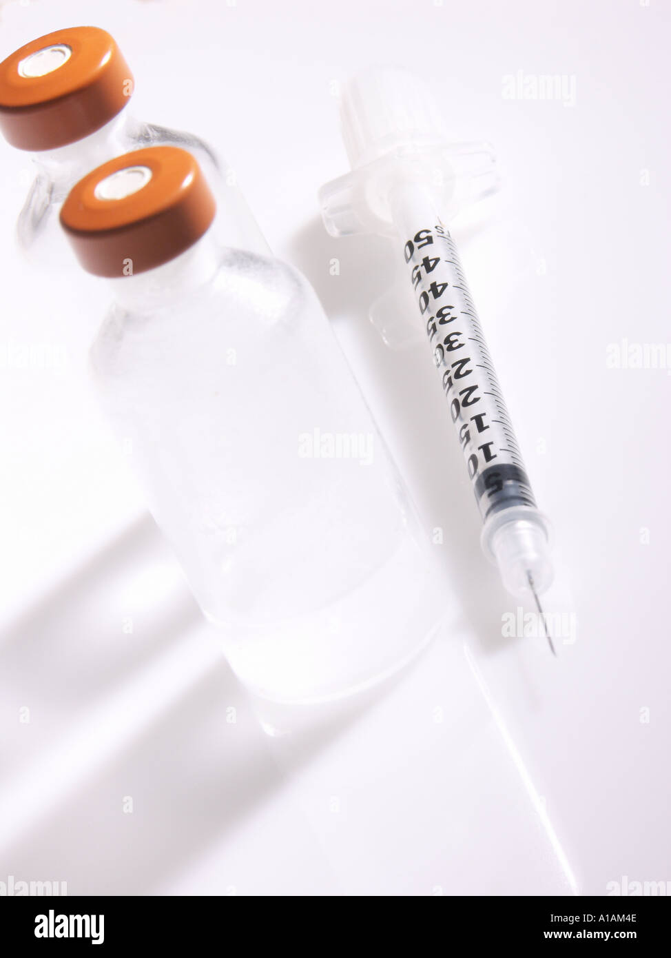 Syringe with insulin bottles Stock Photo - Alamy