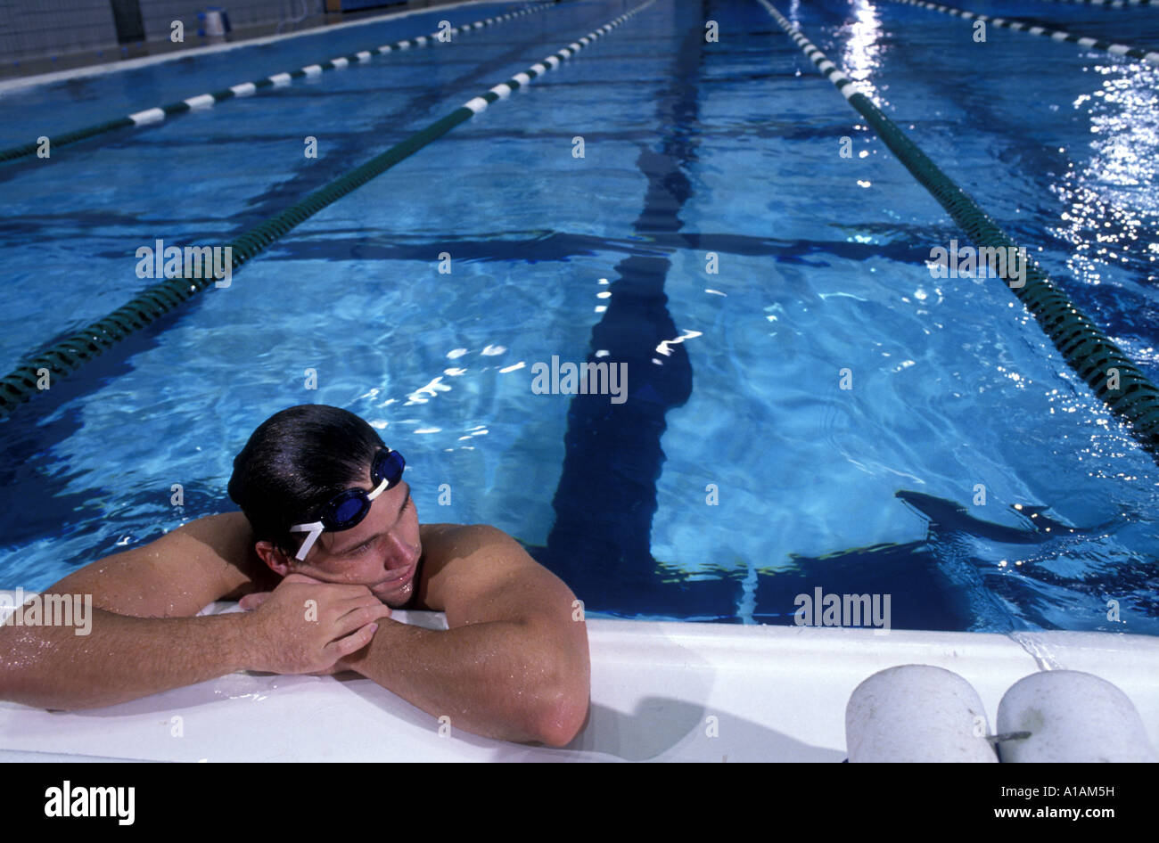USA Alaska Anchorage Swimmer Ken Ralph rests during grueling practice ...