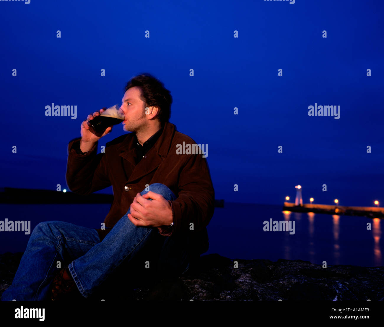 Drinking Guinness Ireland Stock Photo - Alamy